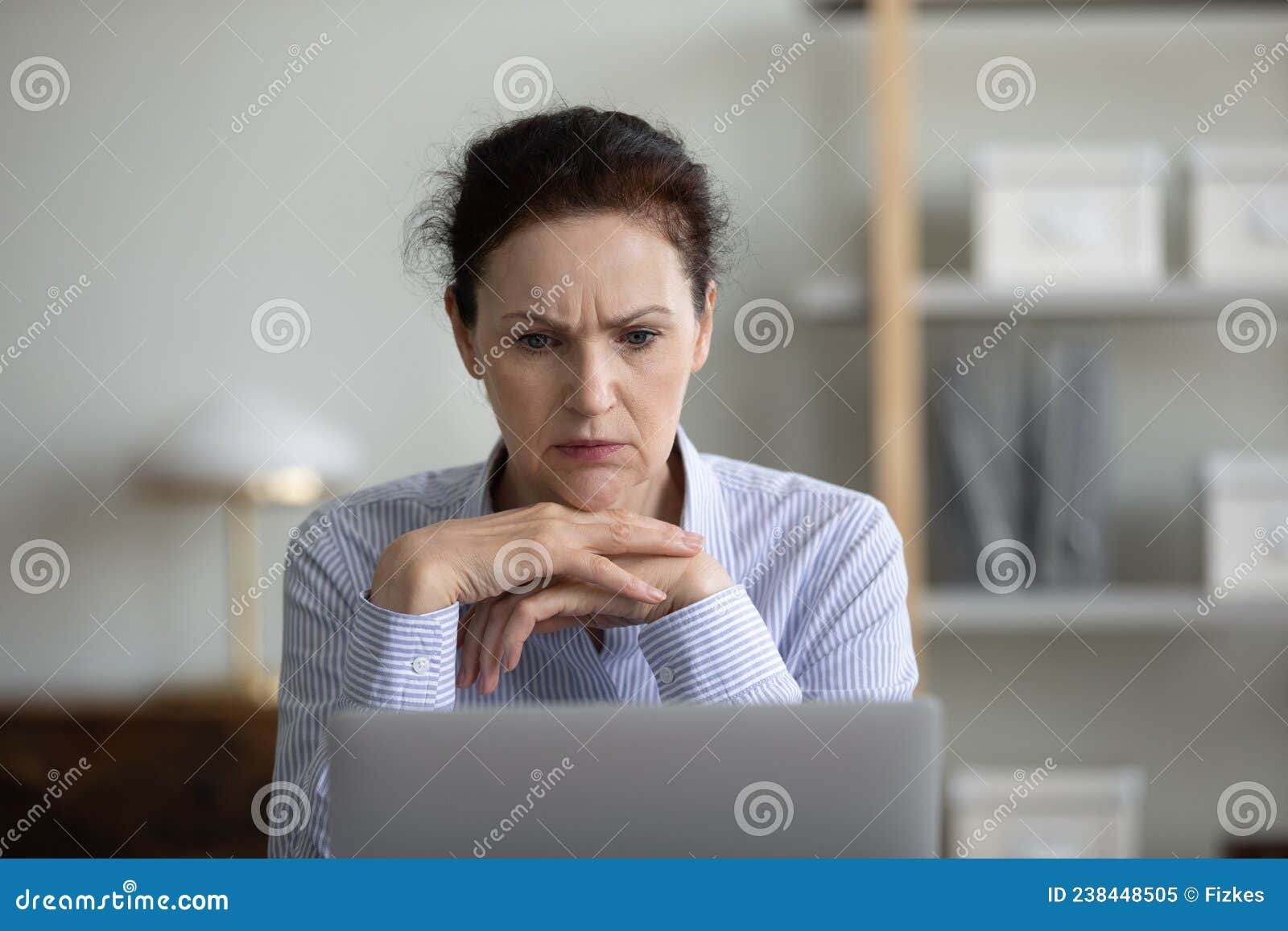 Unhappy Middle Aged Woman Looking at Computer Screen. Stock Image ...