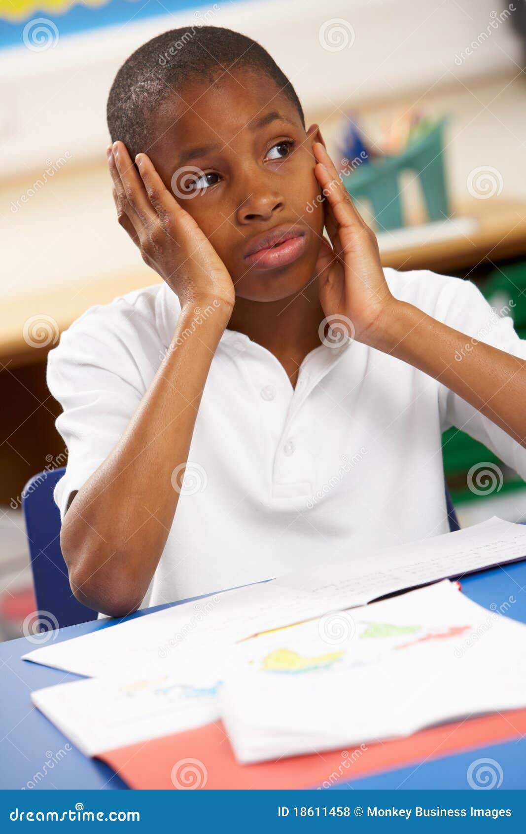 Unhappy Schoolboy Studying in Classroom Stock Photo - Image of school ...