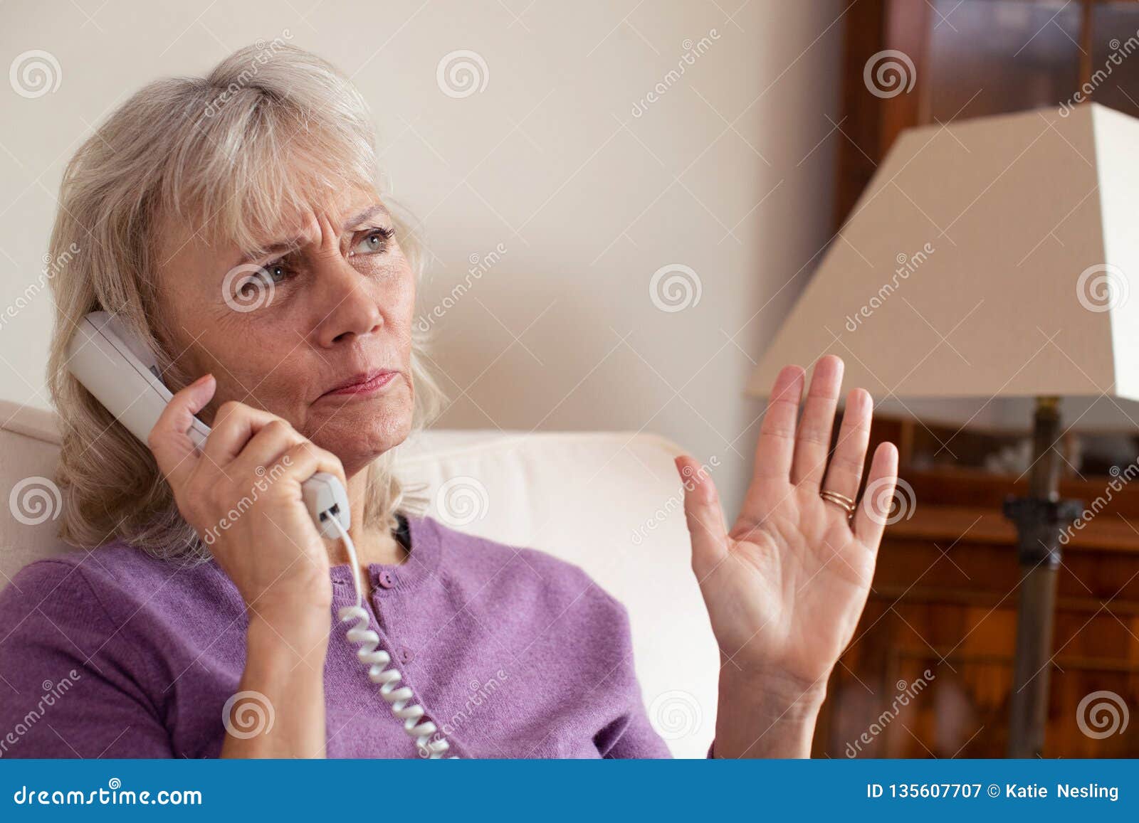 Senior Woman Receiving Unwanted Telephone Call at Home Stock Image ... Senior Woman Receiving Unwanted Telephone Call at Home Stock Image ...