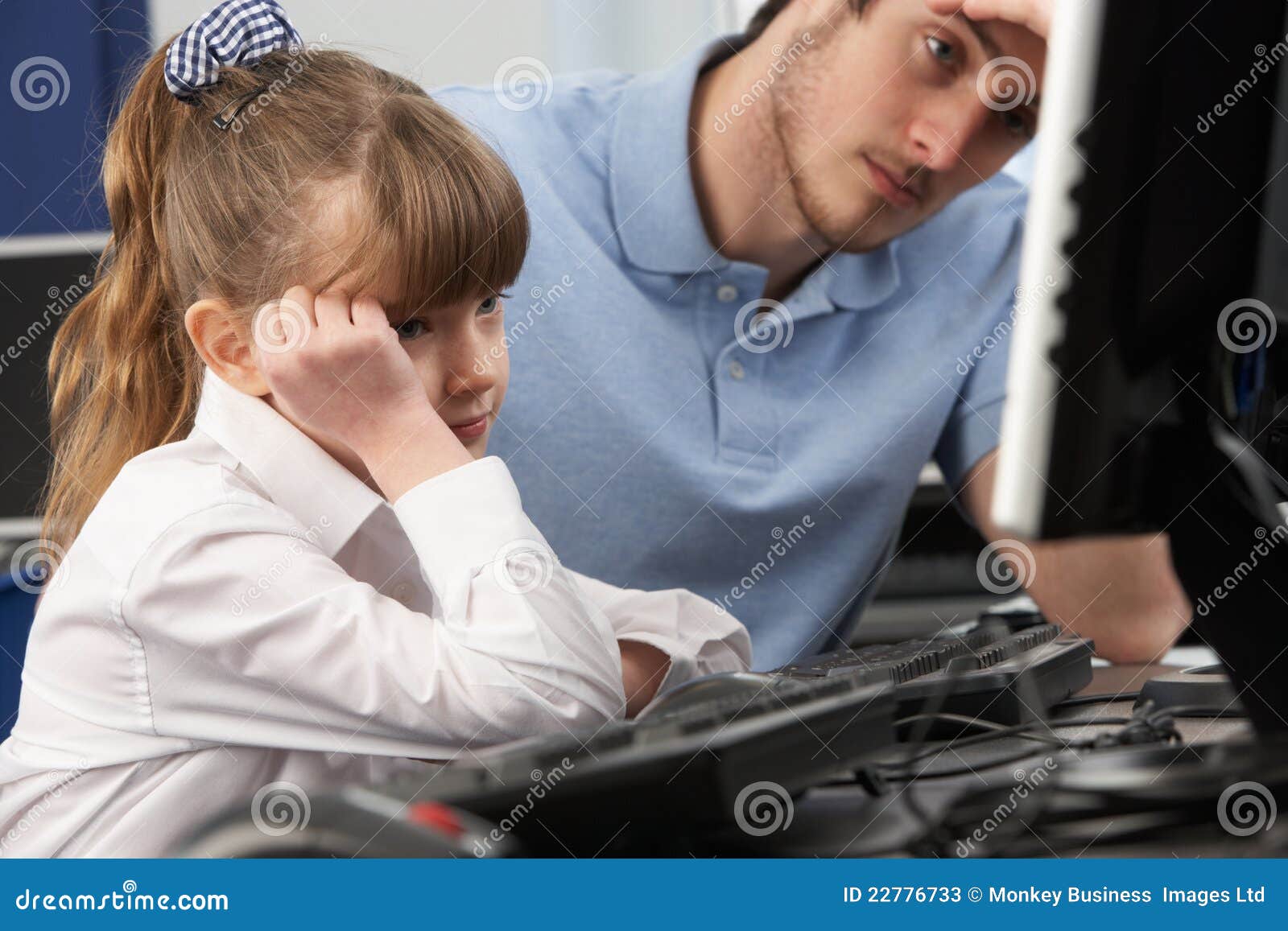 Unhappy Teacher and Girl Using Computer in Class Stock Image - Image of ...