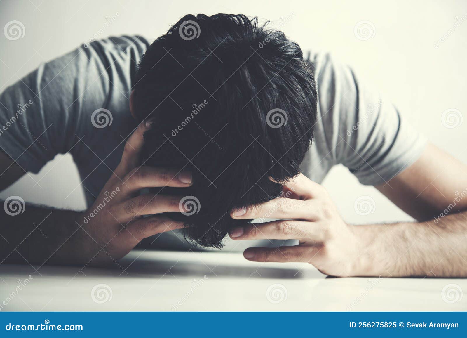 Unhappy Young Man Squeezing Head with Hands Stock Image - Image of ...