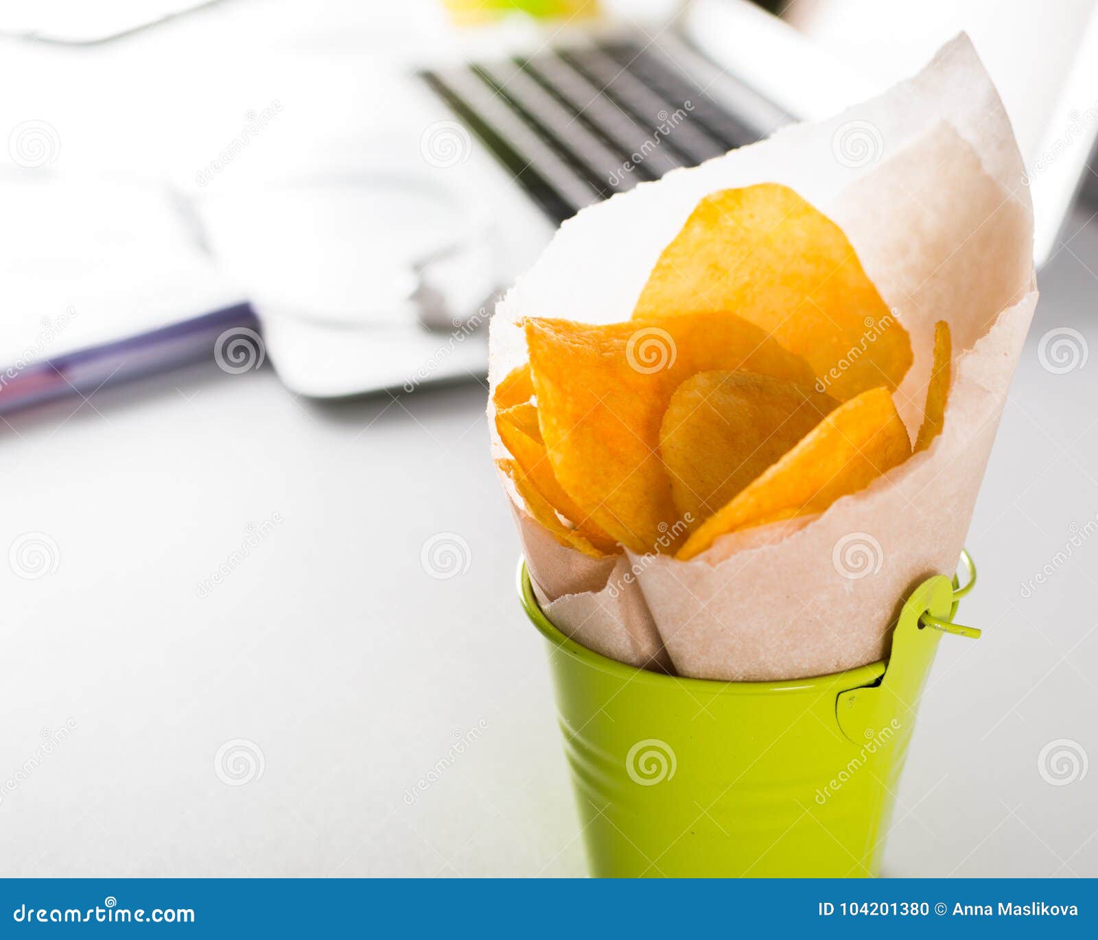 Unhealthy Chips for Snack at Work. Food in the Office Stock Photo ...