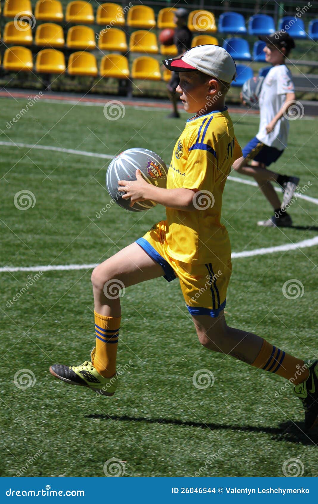 Unidentified Boy Runs with Ball Editorial Stock Image - Image of race ...