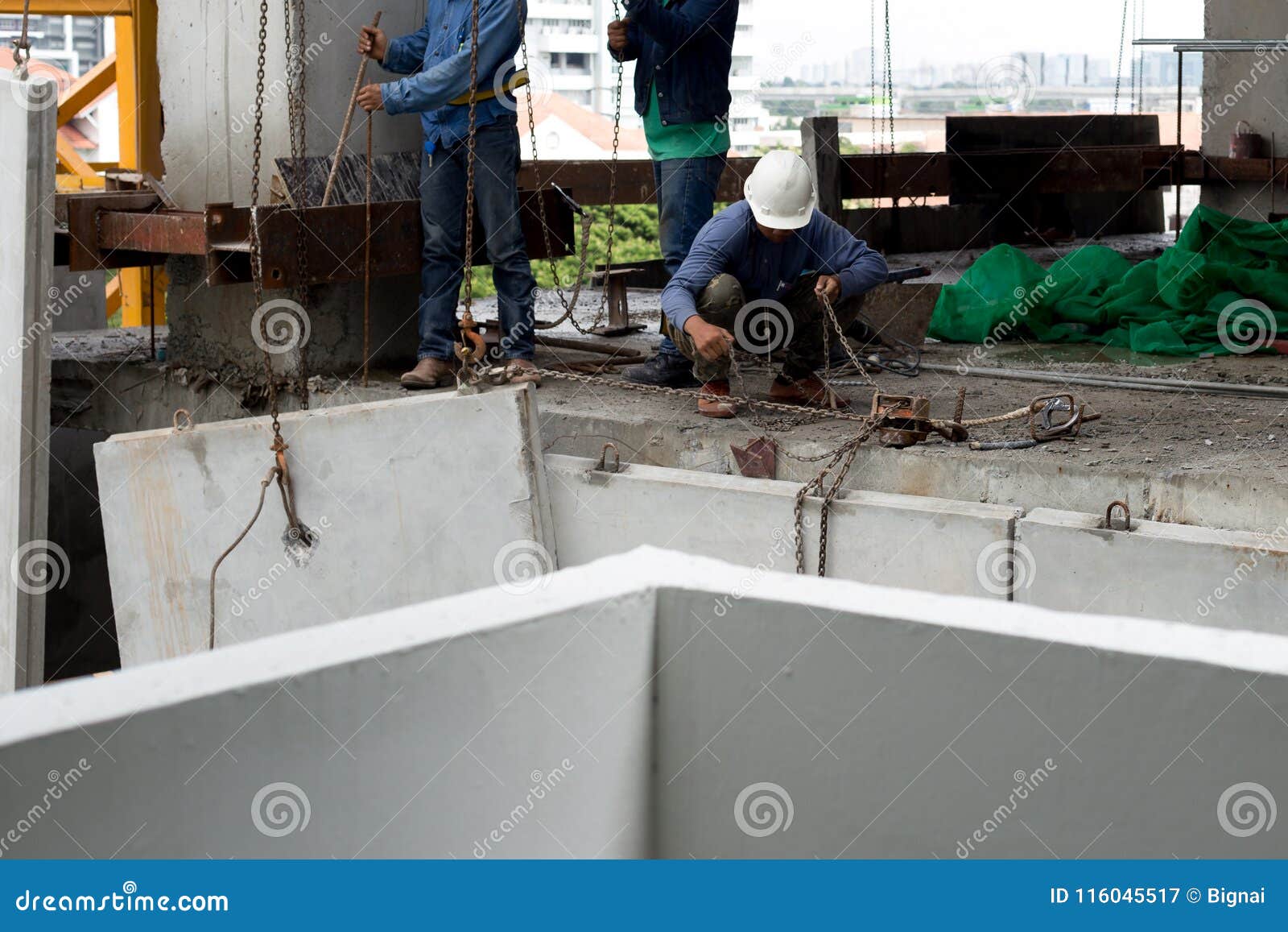 Labor Man Working on Construction Site with Helmet Pulling Concrete ...