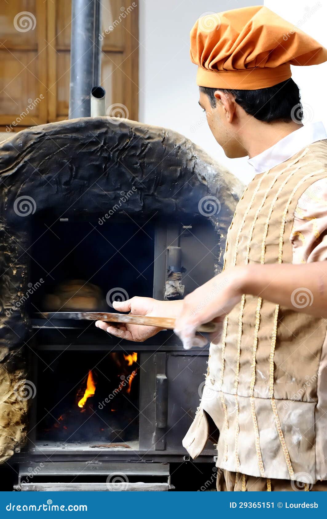 An Unidentified Man Baking Bread in an Oven Editorial Photo - Image of ...