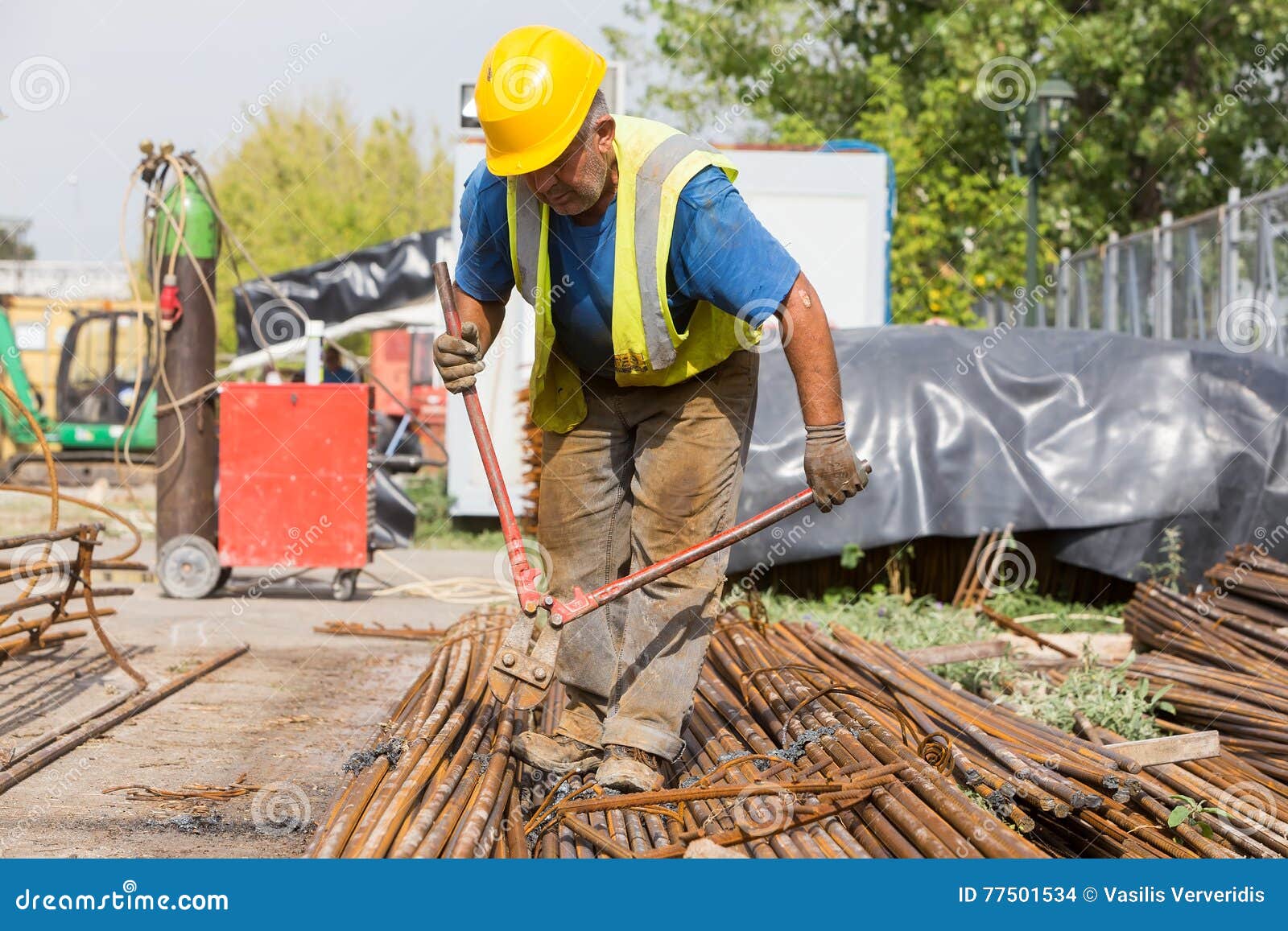 Unidentified Workers Working with Concrete Iron at a Construction Site ...