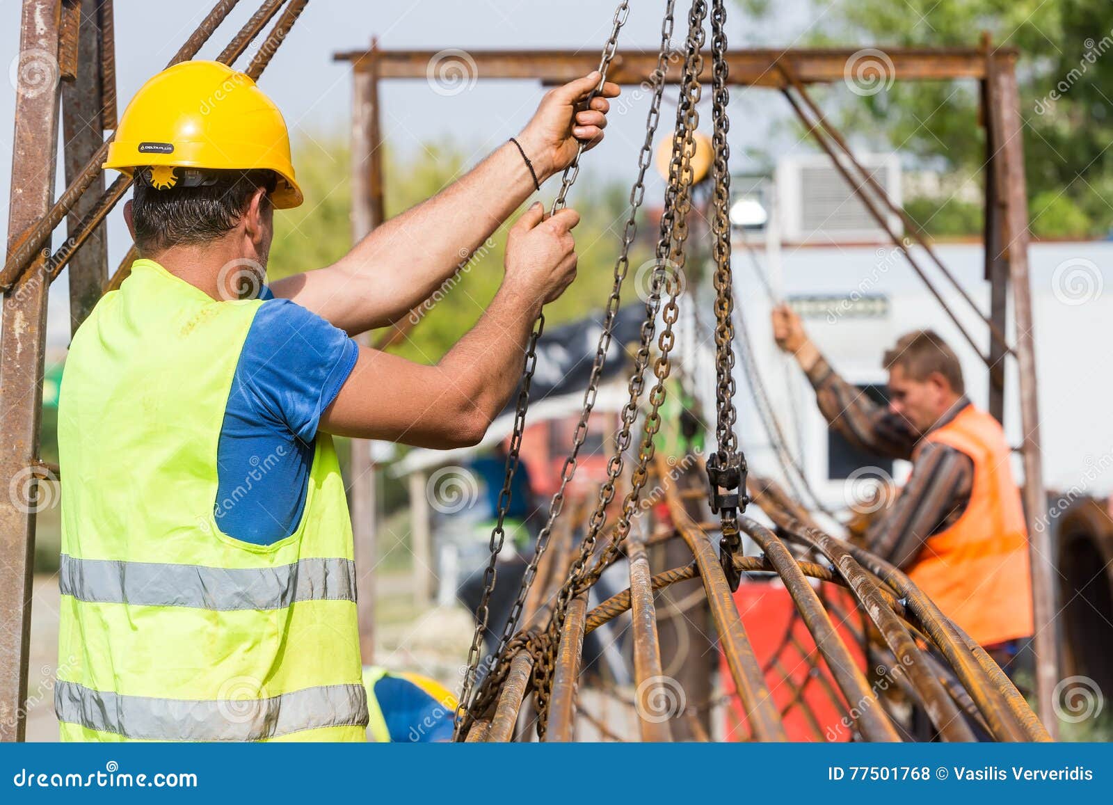 Unidentified Workers Working with Concrete Iron at a Construction Site ...
