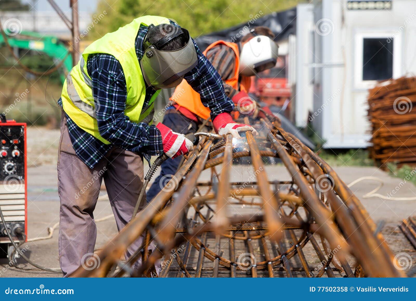 Unidentified Workers Working with Concrete Iron at a Construction Site ...