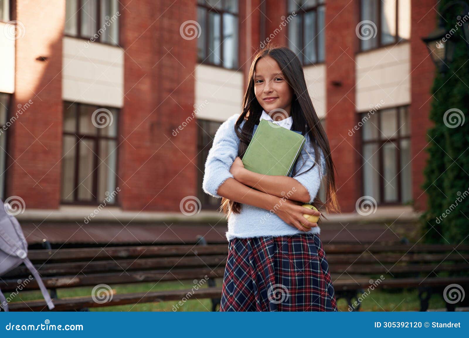 In Uniform, Against Building. School Girl is Outdoors Stock Photo ...