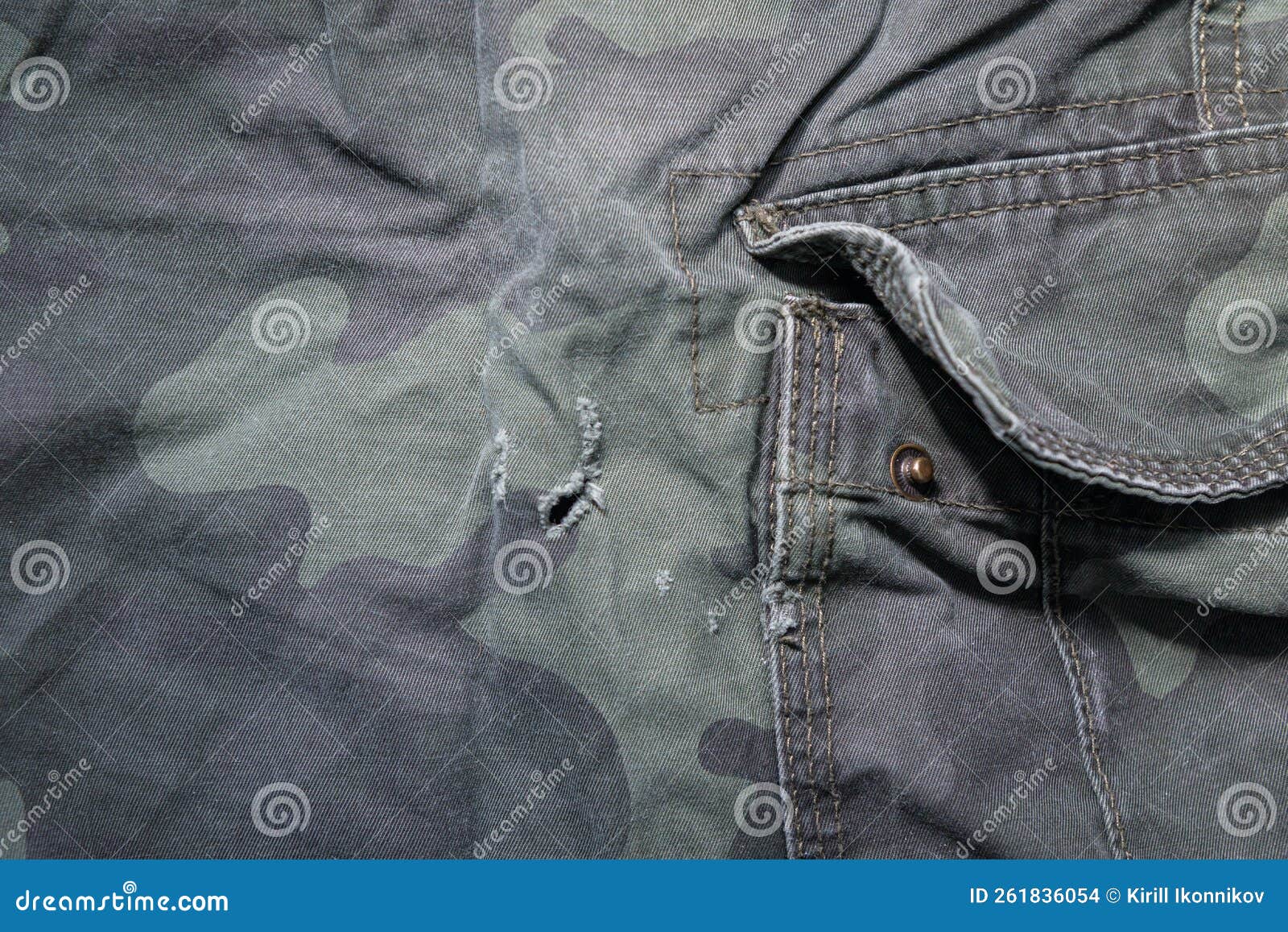 Uniform Damaged. a Hole in the Camouflage Fabric Stock Photo - Image of ...