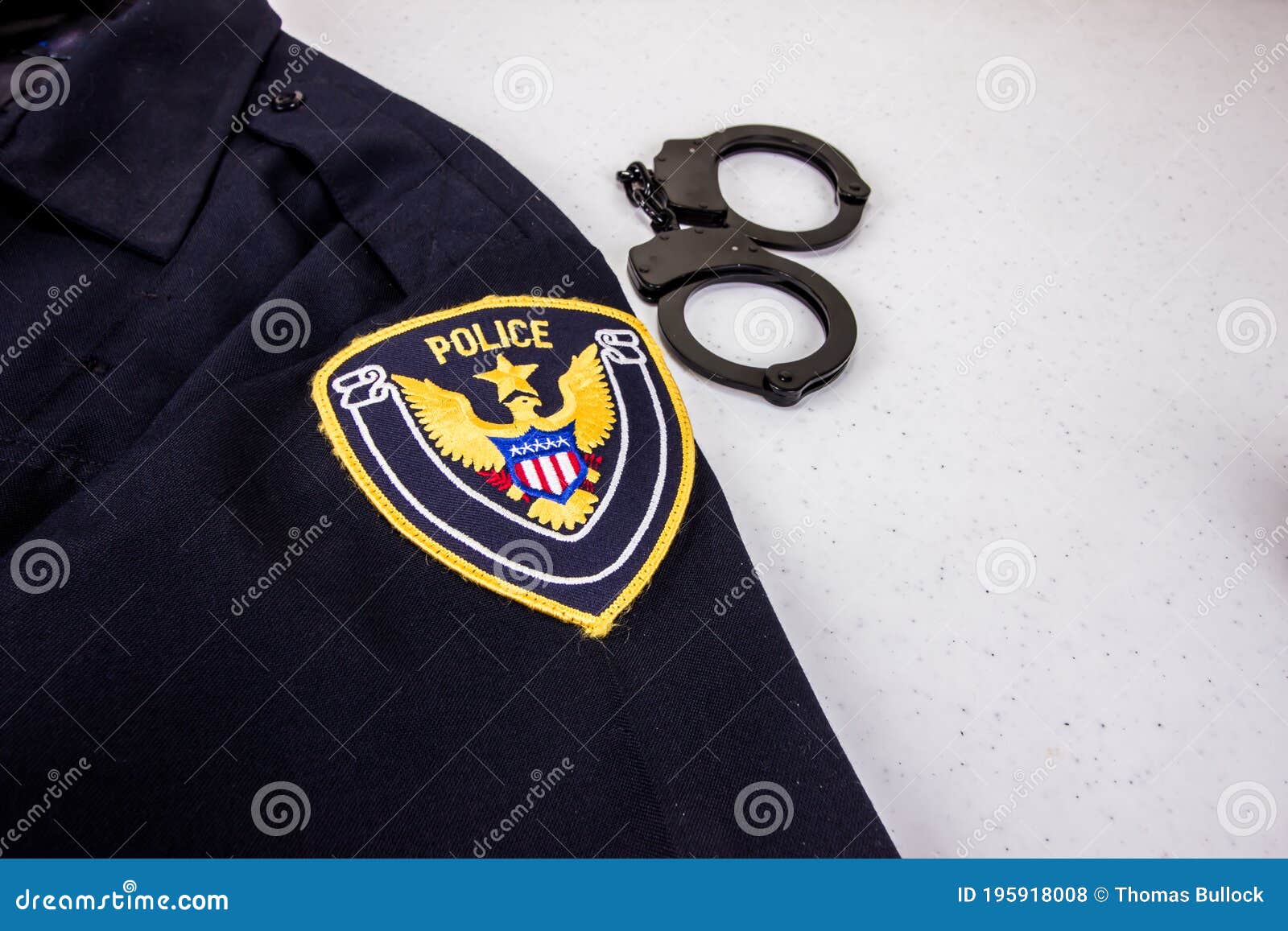 Uniform with Handcuffs and Generic Police Patch Stock Photo - Image of ...