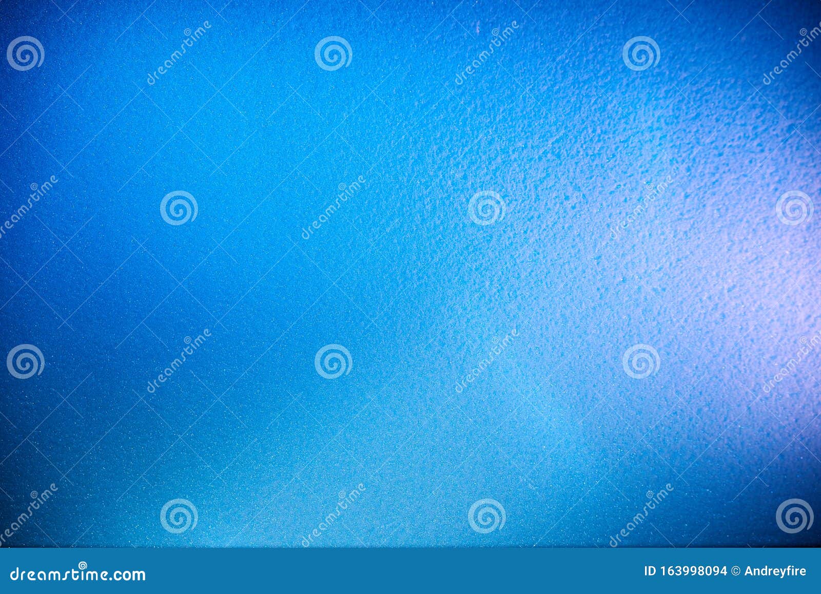 Uniform Textural Blue Background with Partial Blur and Light Pink Glow ...