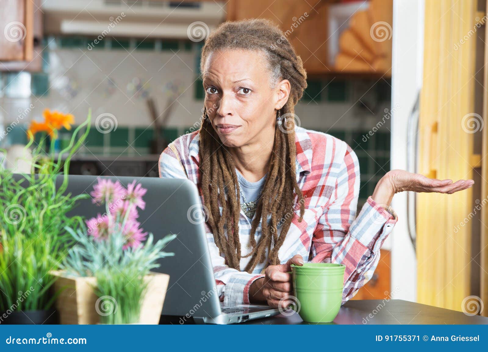 Unimpressed Woman in Kitchen with Compute Stock Image - Image of ...