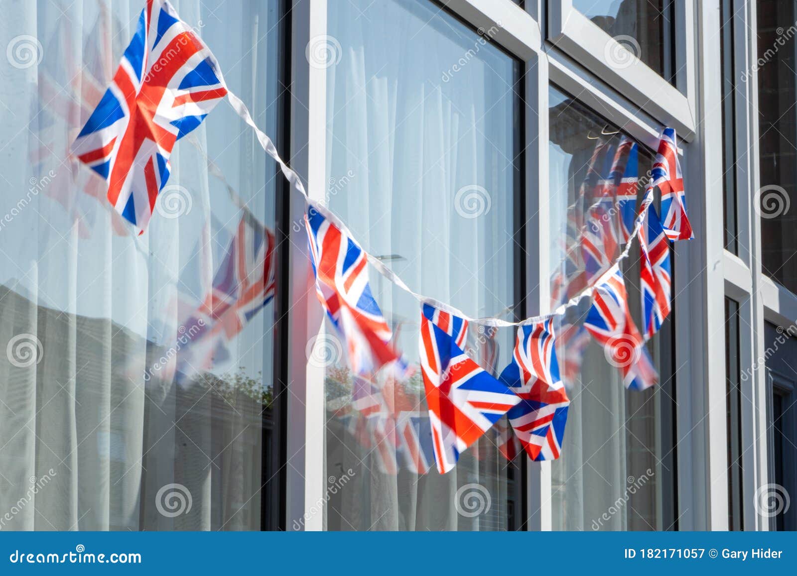 Union Jack Bunting or British Flags on the Outside of a British House ...