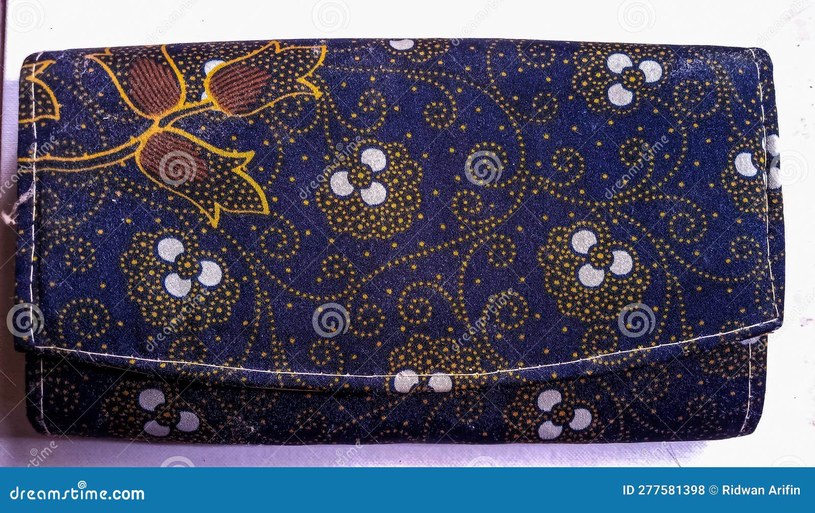 Unique Batik Pattern Wallet with Low Light Background Stock Photo ...