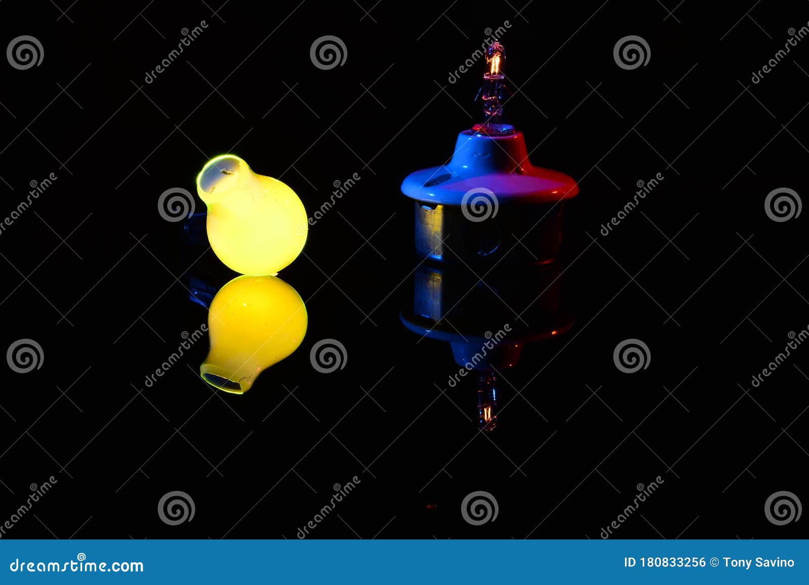 Broken Light Bulb with Power Isolated on Black with Reflections Stock ...