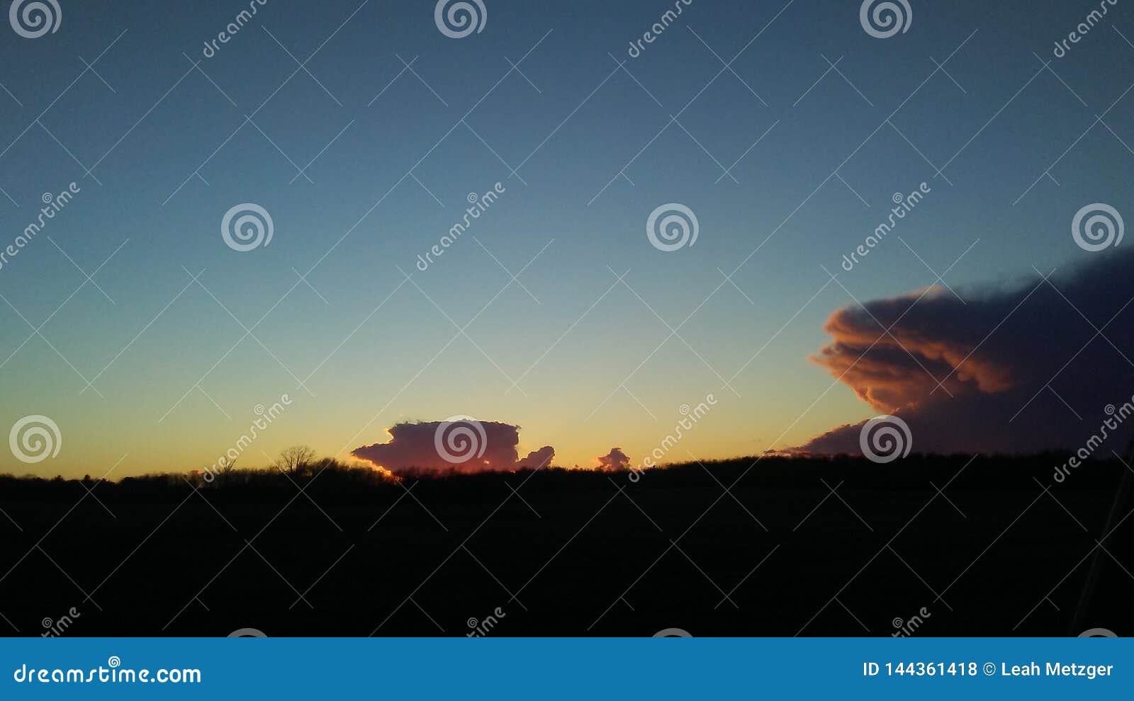 Unique Cloud Formation stock photo. Image of sunset - 144361418