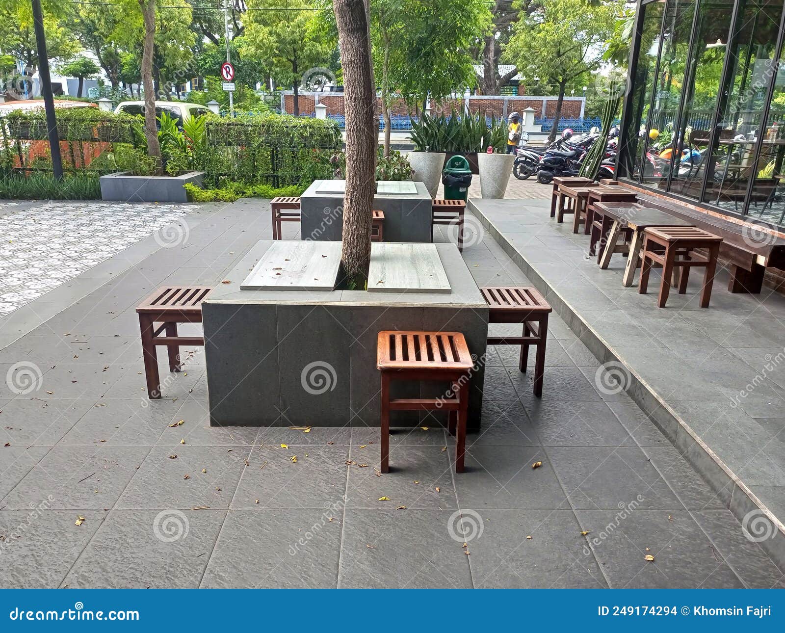 Unique Decoration of Chairs and Tables Under a Tree in a Dining Area ...