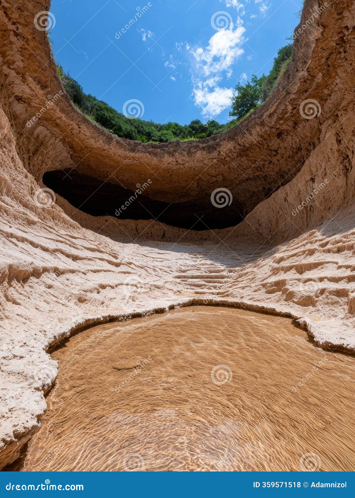 A Unique Geological Formation with a Pool of Water at the Bottom. Stock ...