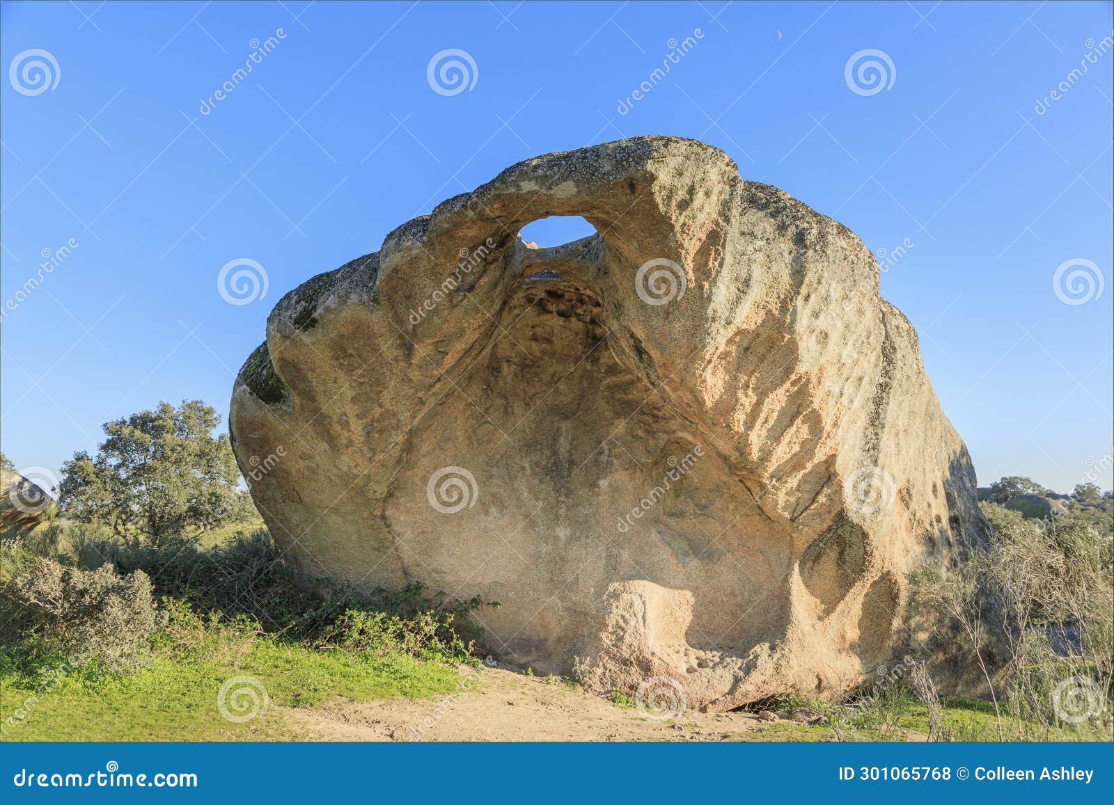 Unique Granite Boulder with a Hole Worn through Stock Photo - Image of ...