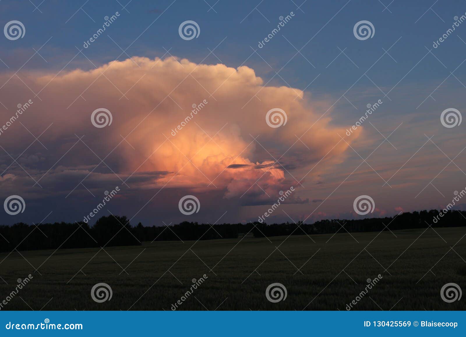 Storm cloud over fields stock image. Image of stormy - 130425569