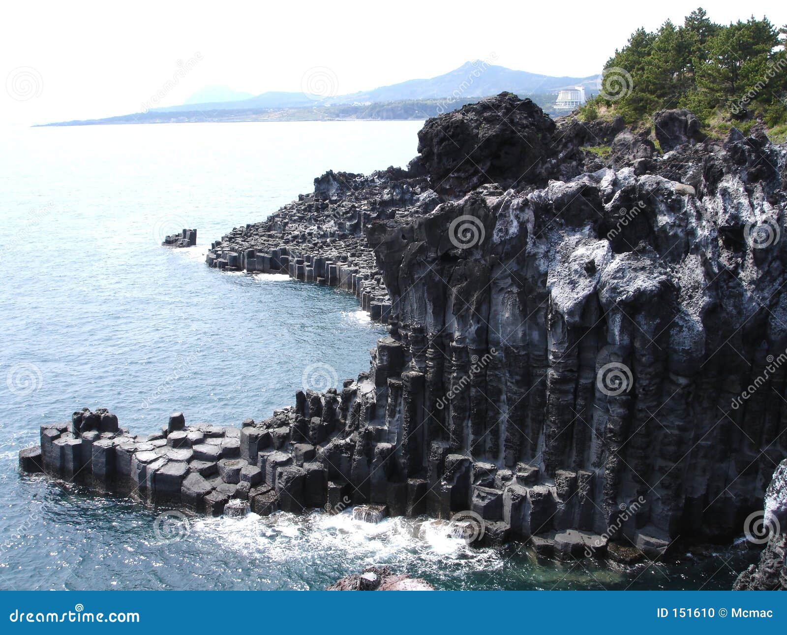 Unique rock cliff stock photo. Image of water, rocky, nature - 151610