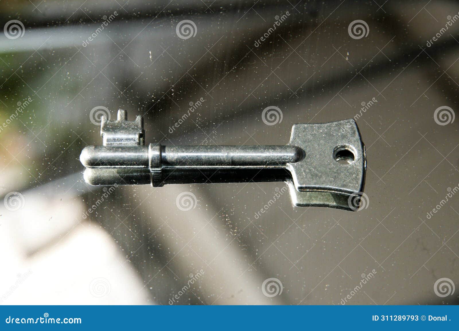 Unique Silver House Key on a Glass Table with Reflection Stock Image ...