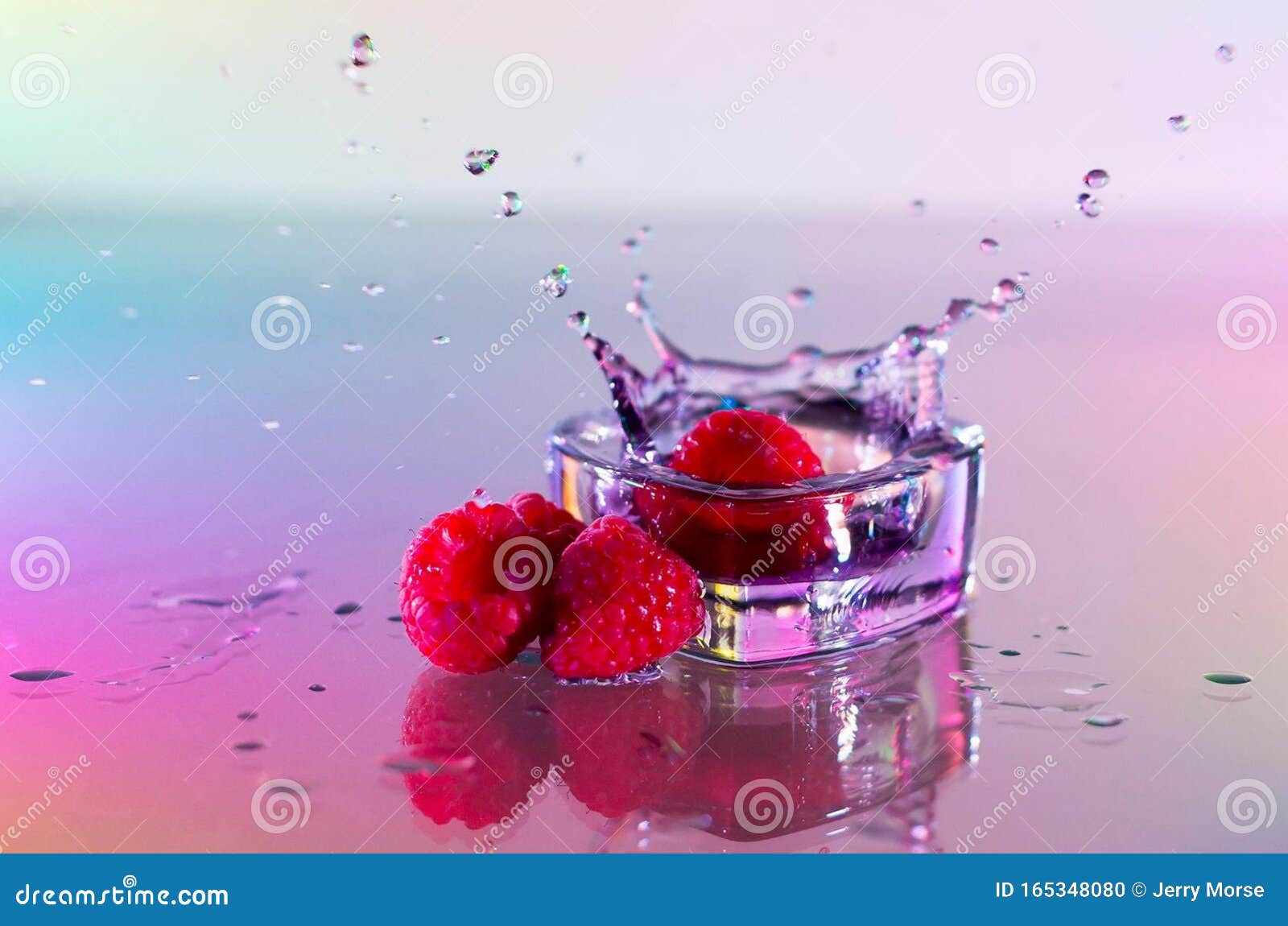 Colorful Raspberry Splash stock photo. Image of raspberry - 165348080