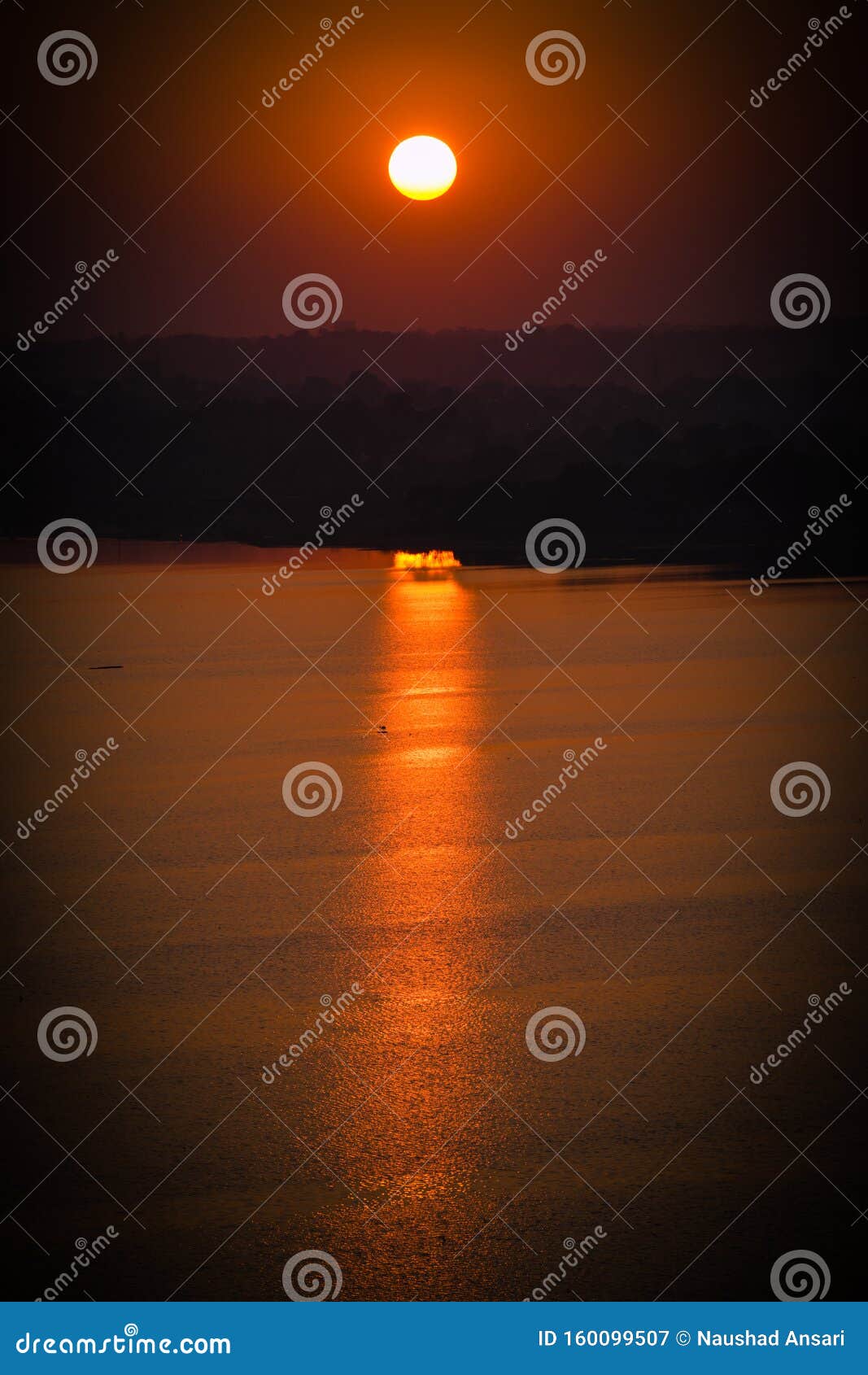 A Unique View of the Sunset in Which the Rays of the Sun are Falling on ...
