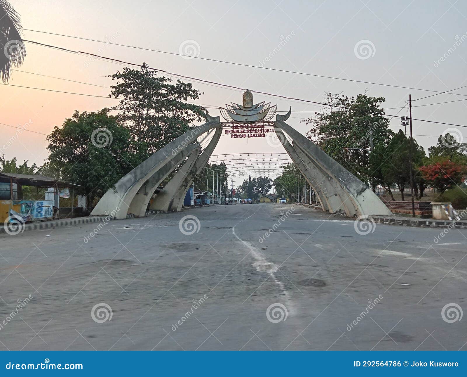 A unique white gate enters stock photo. Image of iron - 292564786