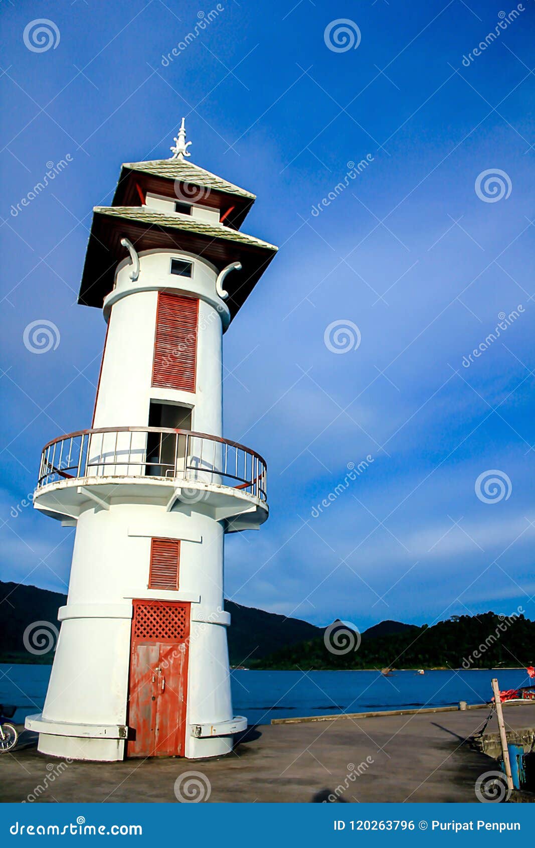 White Lighthouse is Prominent. the Bay`s Identity. Stock Photo - Image ...