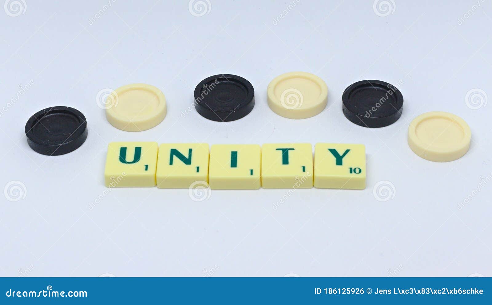 Unity in Alphabet Letters and Playing Pieces from Board Games Stock ...