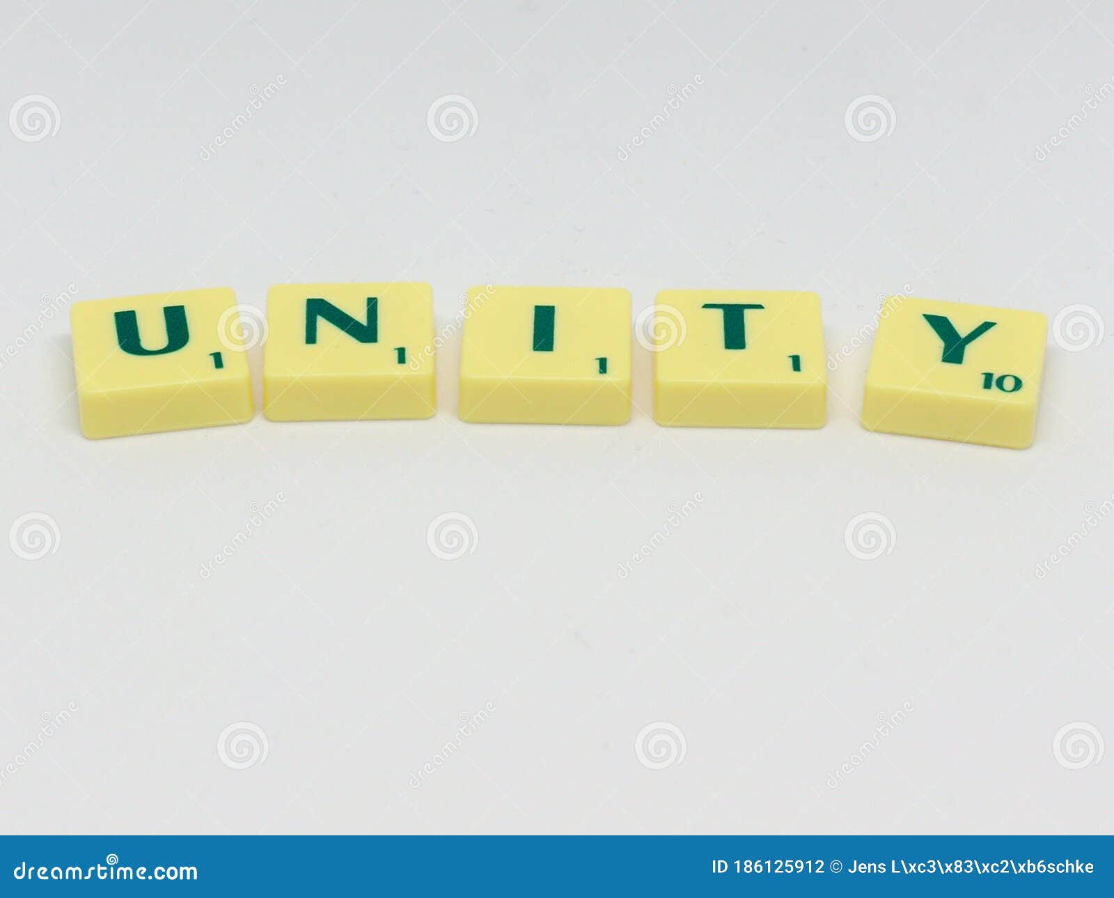 Unity in Alphabet Letters and Playing Pieces from Board Games Stock ...