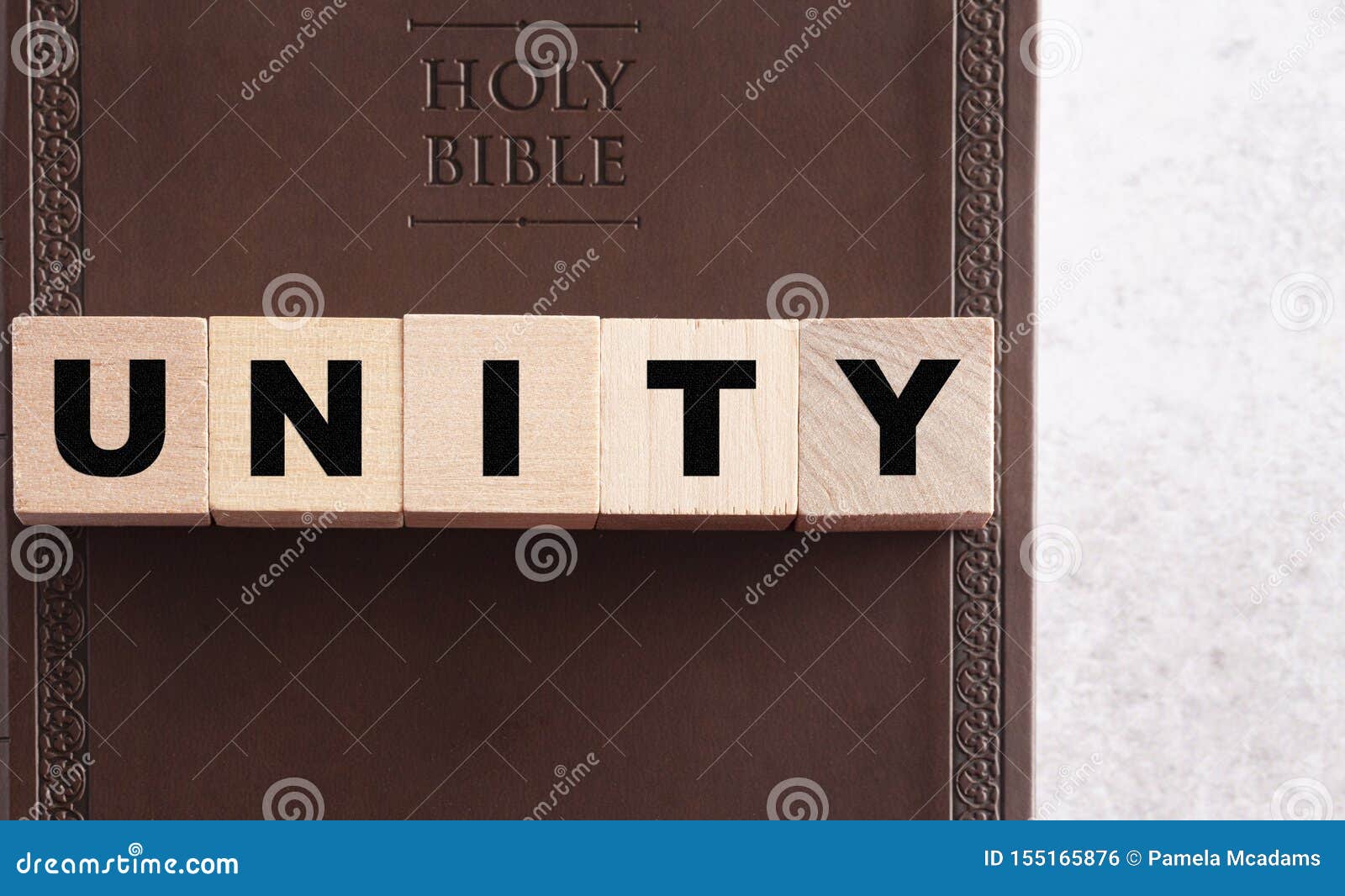 Unity Spelled In Blocks On A Leather Holy Bible Stock Photography ...