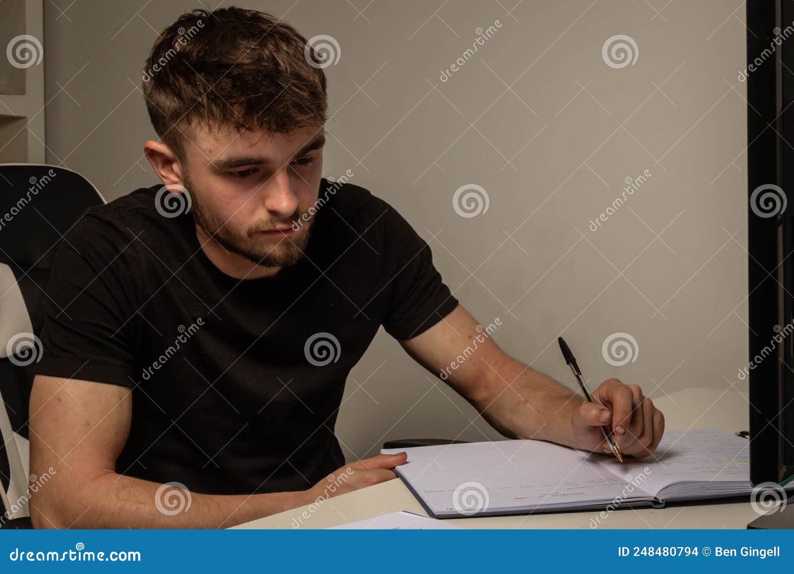 A University Aged Male Student Stock Photo - Image of study, studying ...