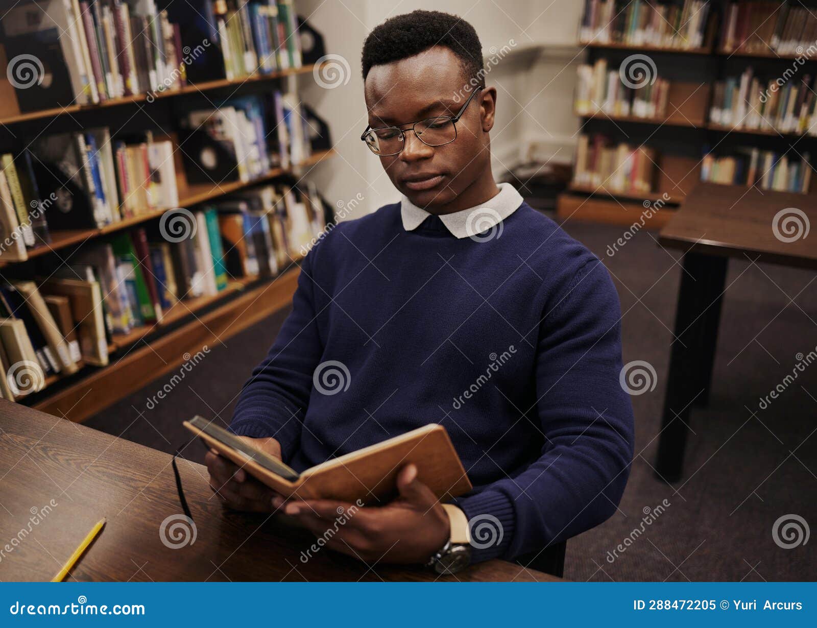 University, Book and Black Man Student Reading and Learning in a ...