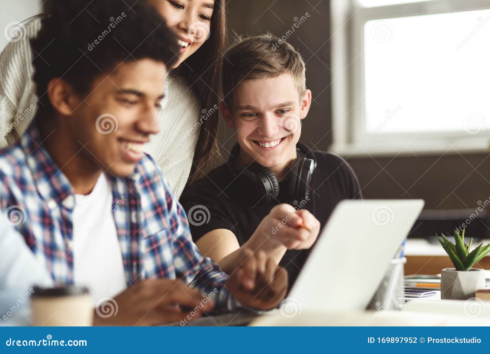 University Classmates Doing Project with Laptop Computer Stock Photo ...