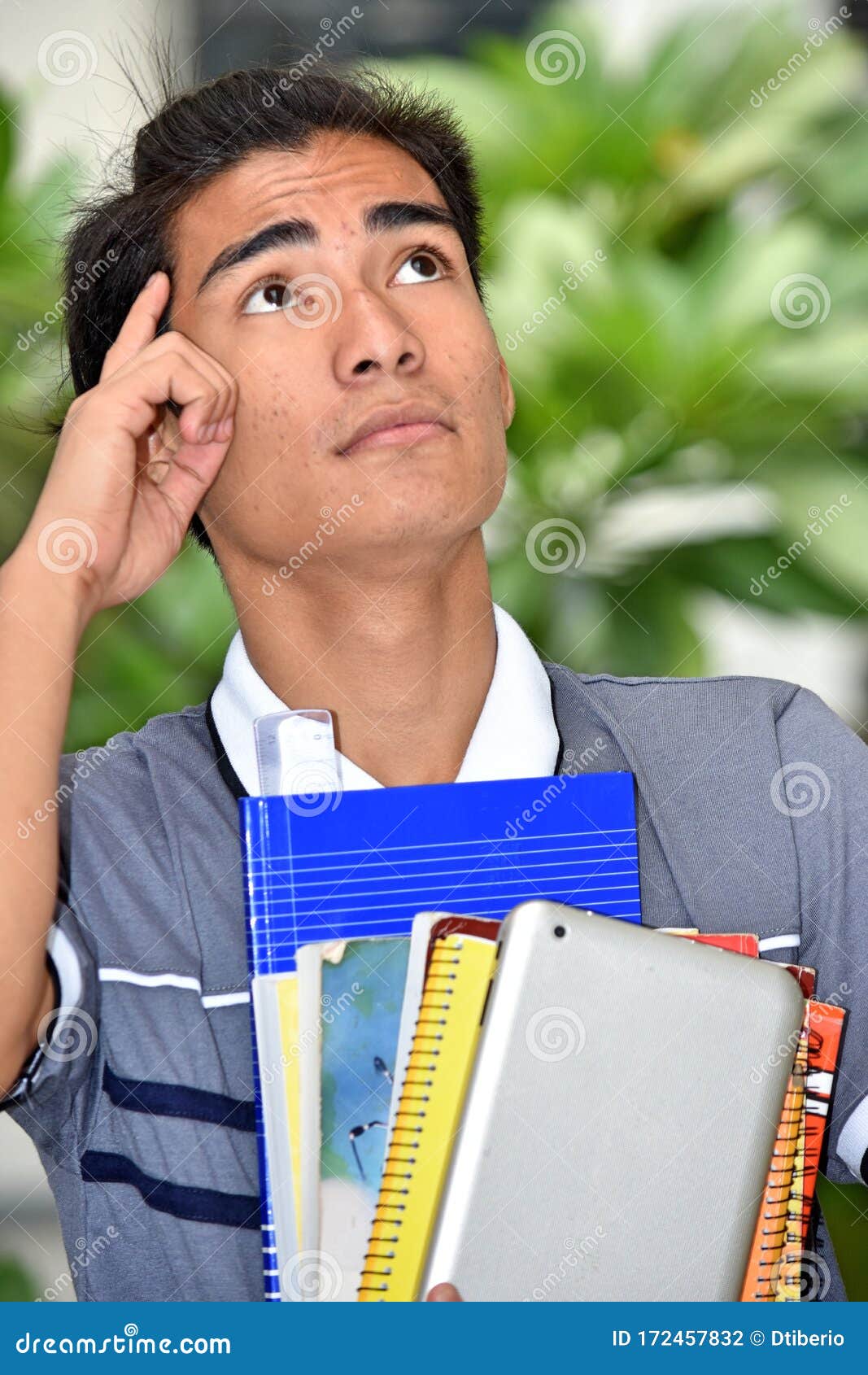 University Diverse Boy Student Thinking with Notebooks Stock Photo ...
