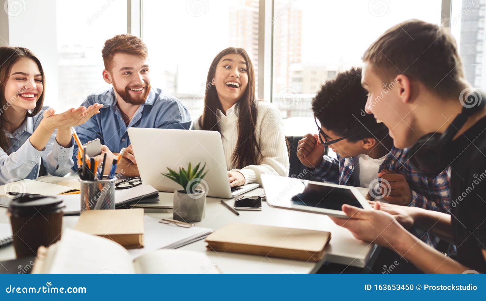 University Friends Enjoying Group Study in Library Stock Photo - Image ...