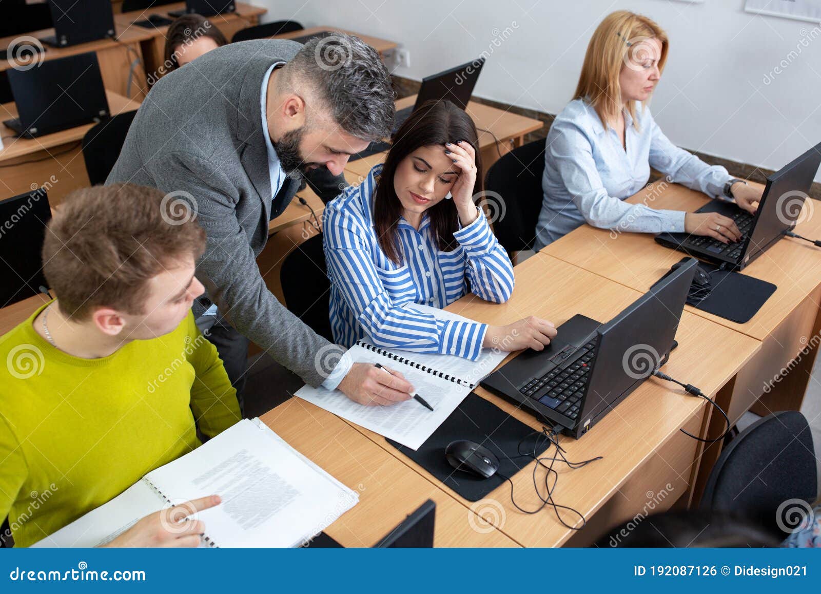 University Professor Lecturing Small Group of Students Stock Photo ...