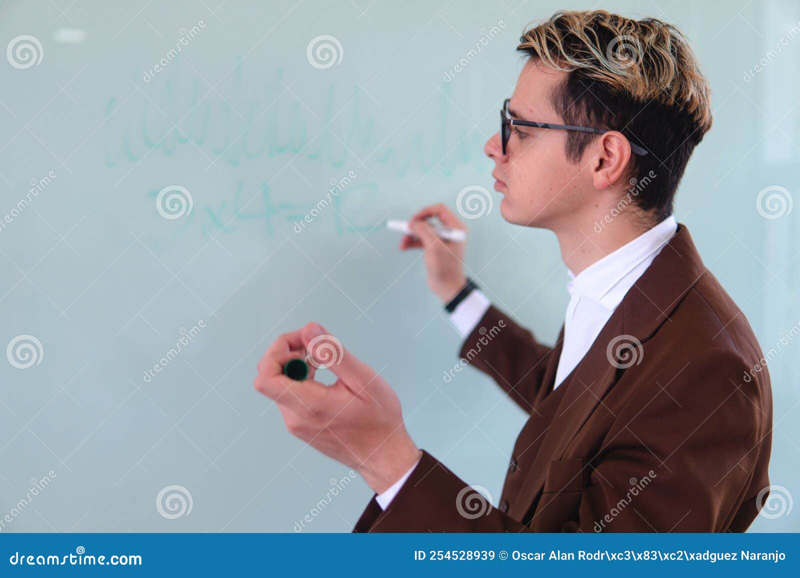 A University Professor Sketching in the Middle of a Class on the ...