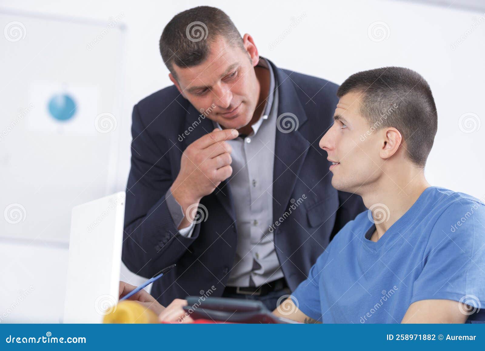 University Student Discussing Project in Classroom Stock Photo - Image ...