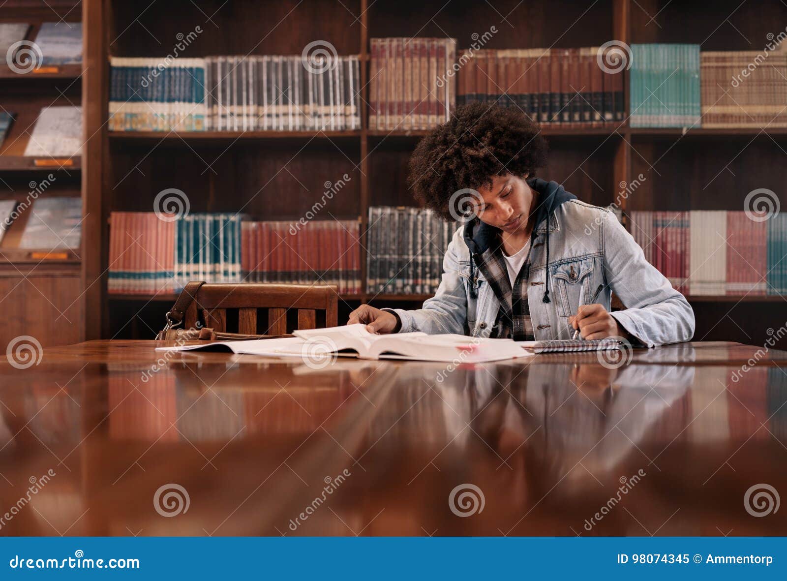 University Student Doing Assignment in Library Stock Image - Image of ...