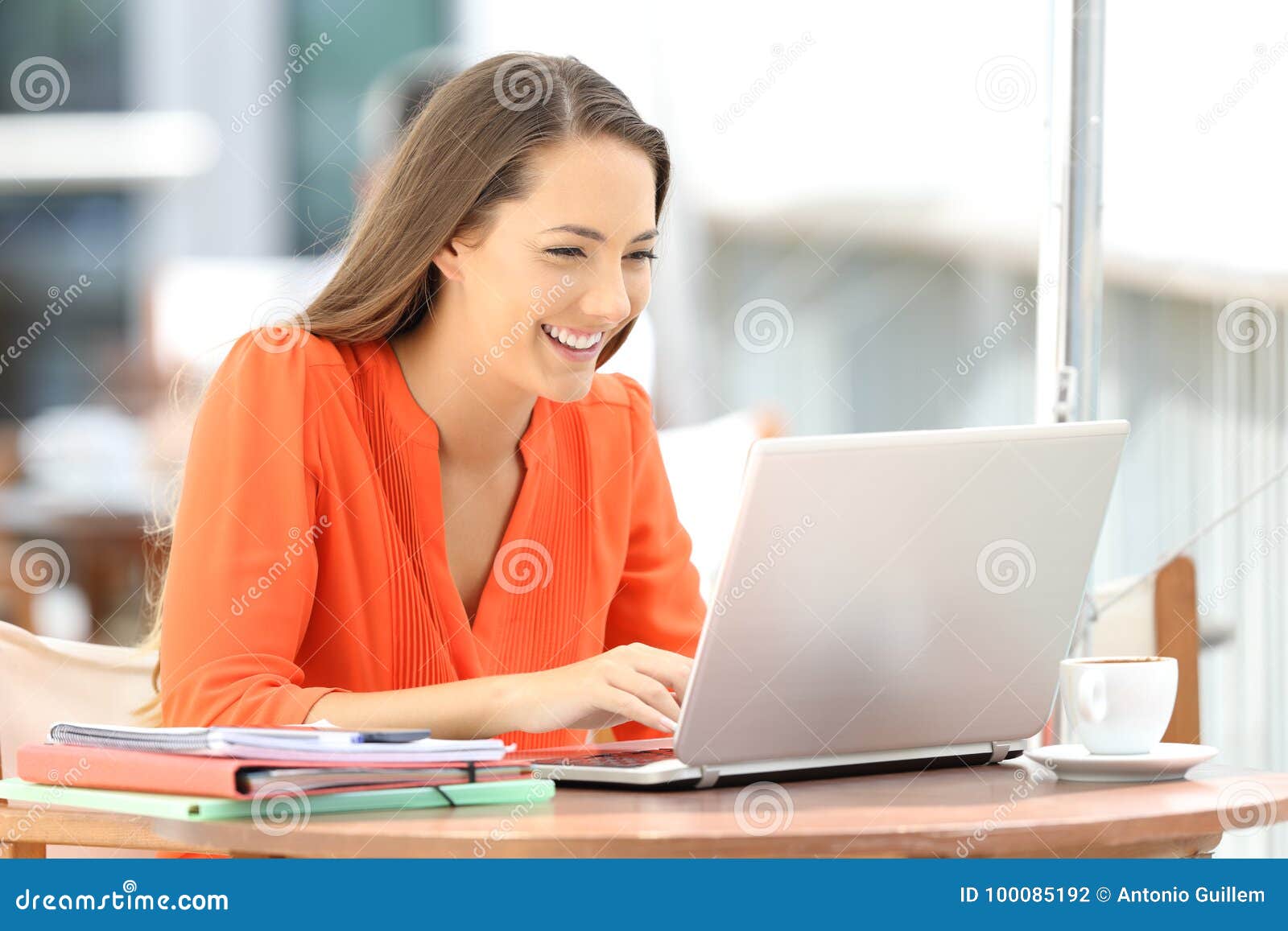 University Student E-learning with a Laptop in a Bar Stock Photo ...