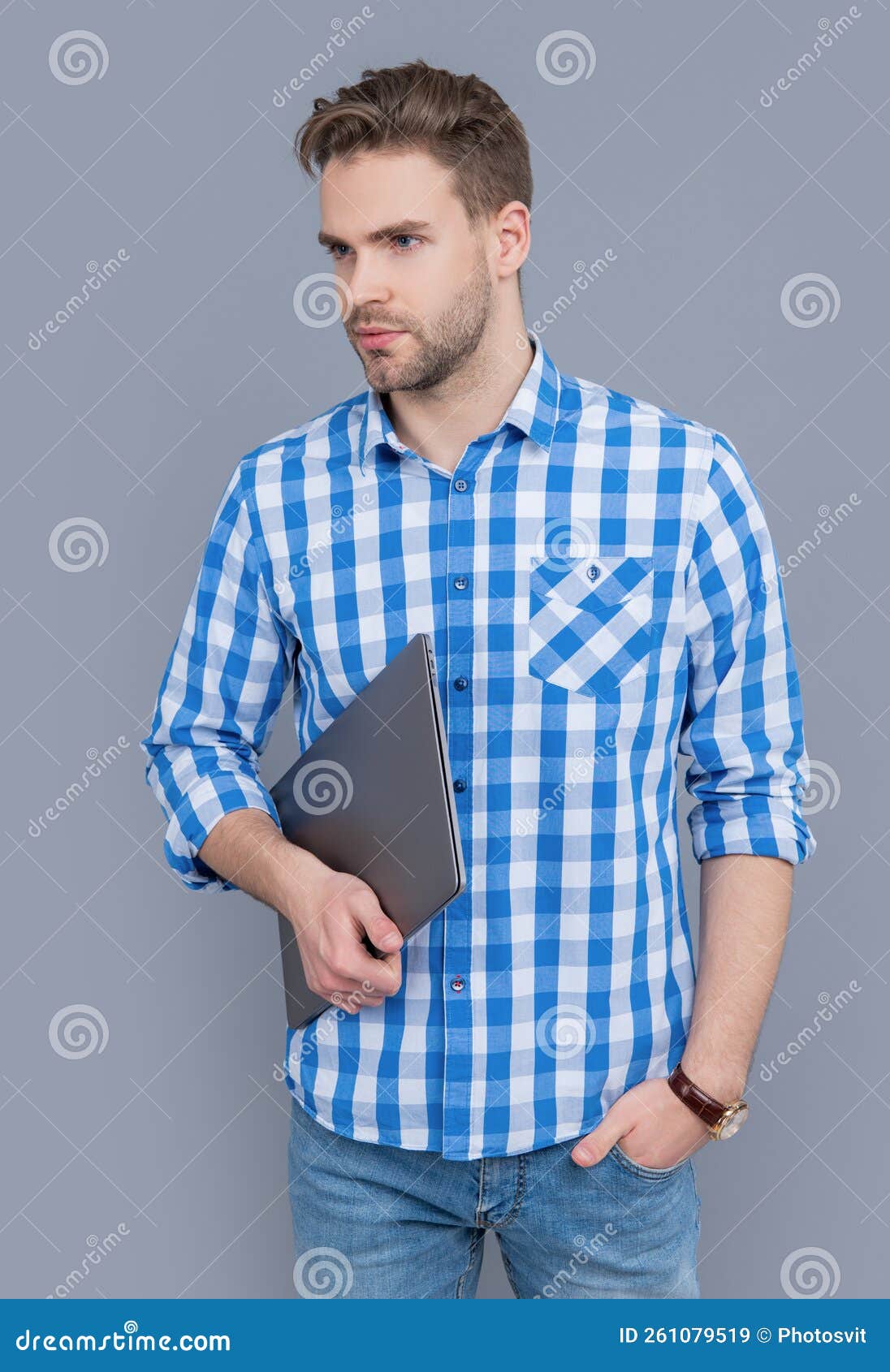University Student with Laptop Studio. Serious Man Holding Laptop ...