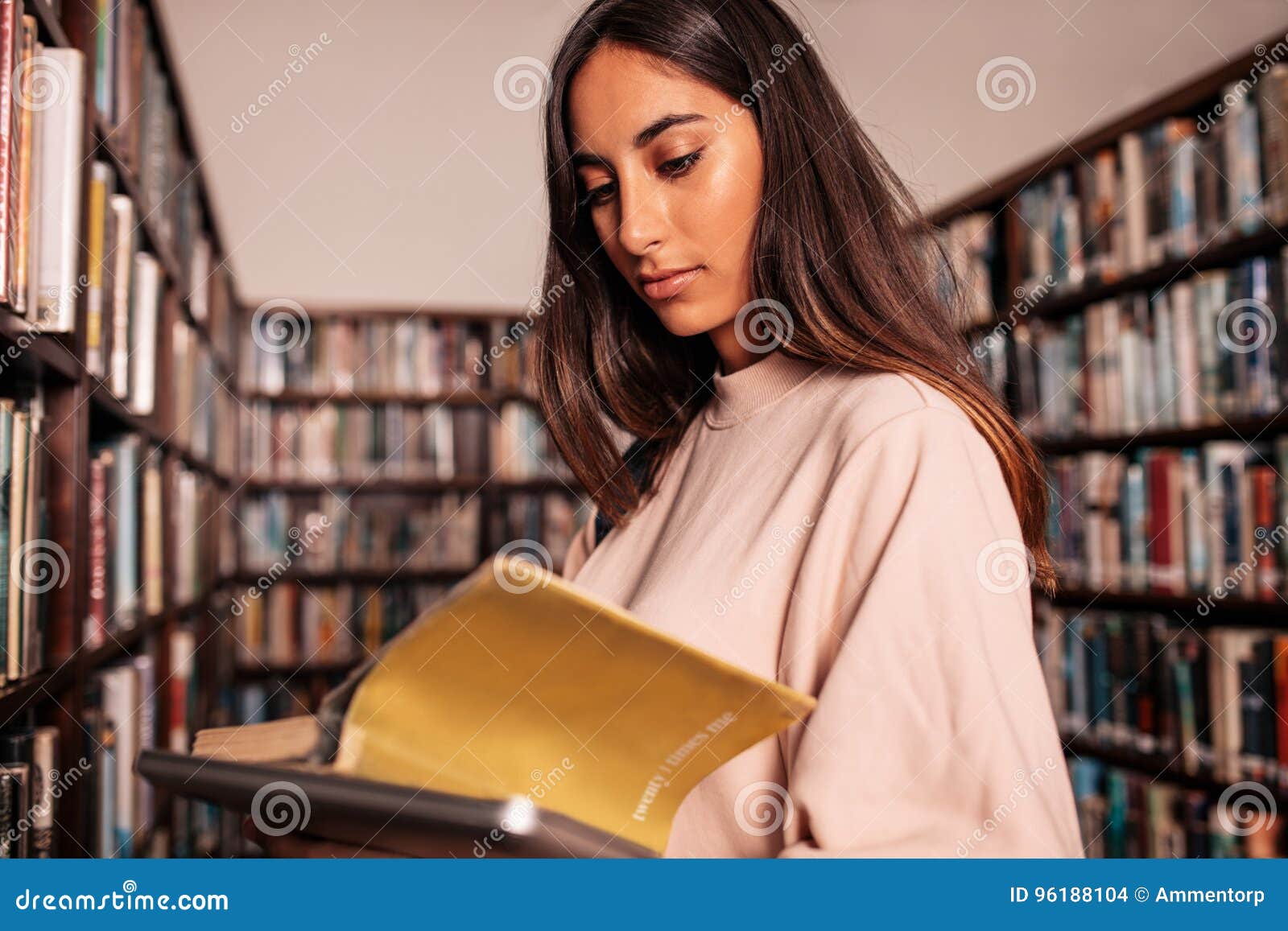 University Student Reading Book in College Library Stock Photo - Image ...