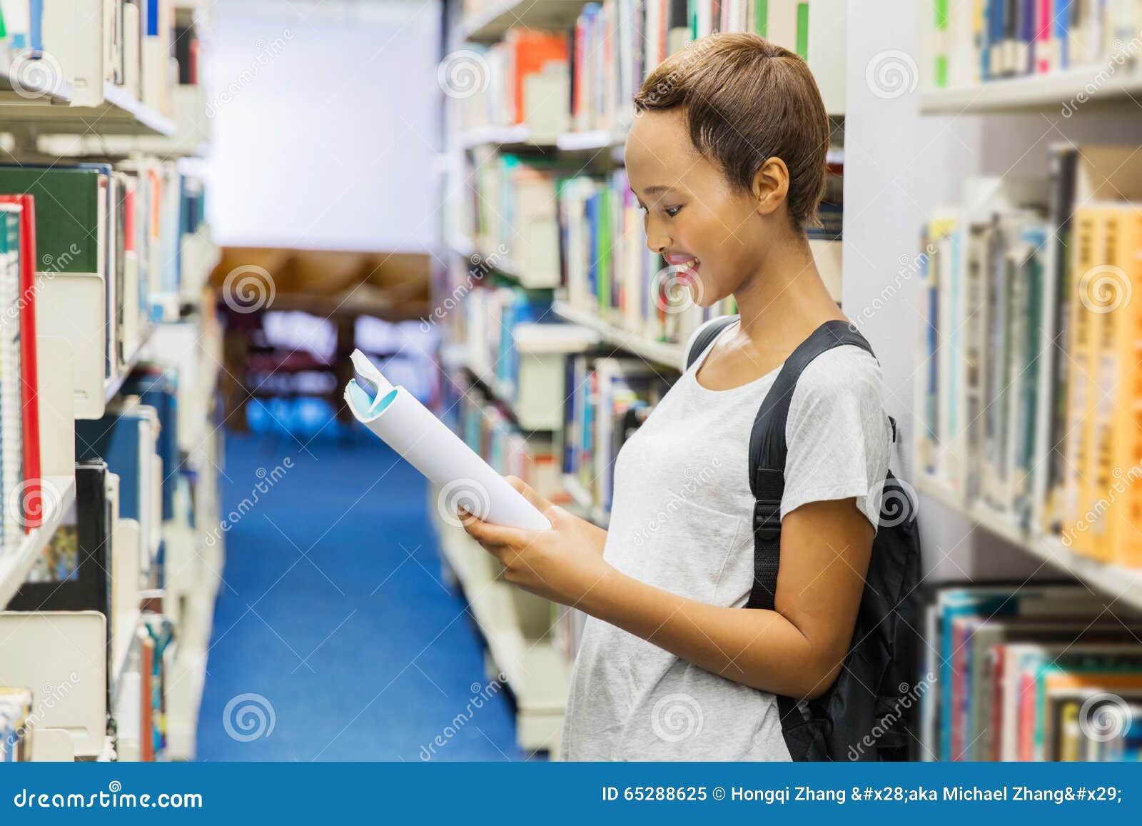 University Student Reading a Book Stock Image - Image of cute, black ...