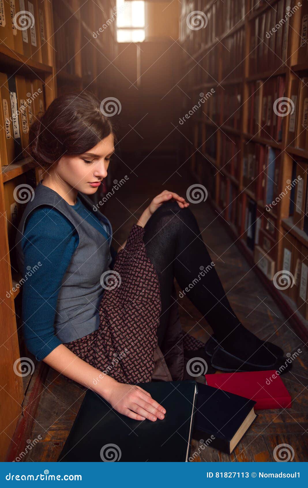 University Student Sitting on a Floor of Library. Stock Image - Image ...