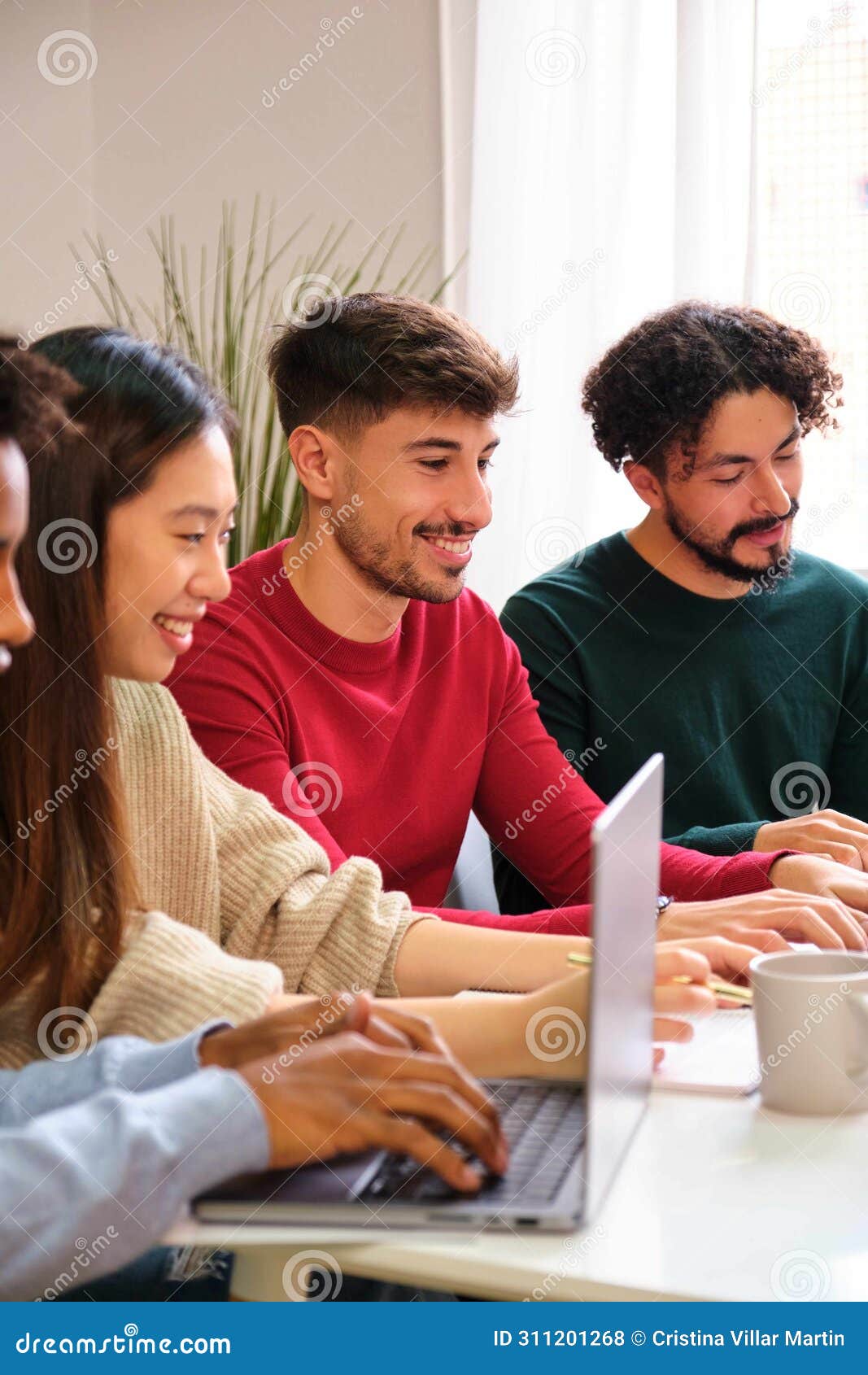 University Student Studying with His Colleagues Together at Shared Flat ...
