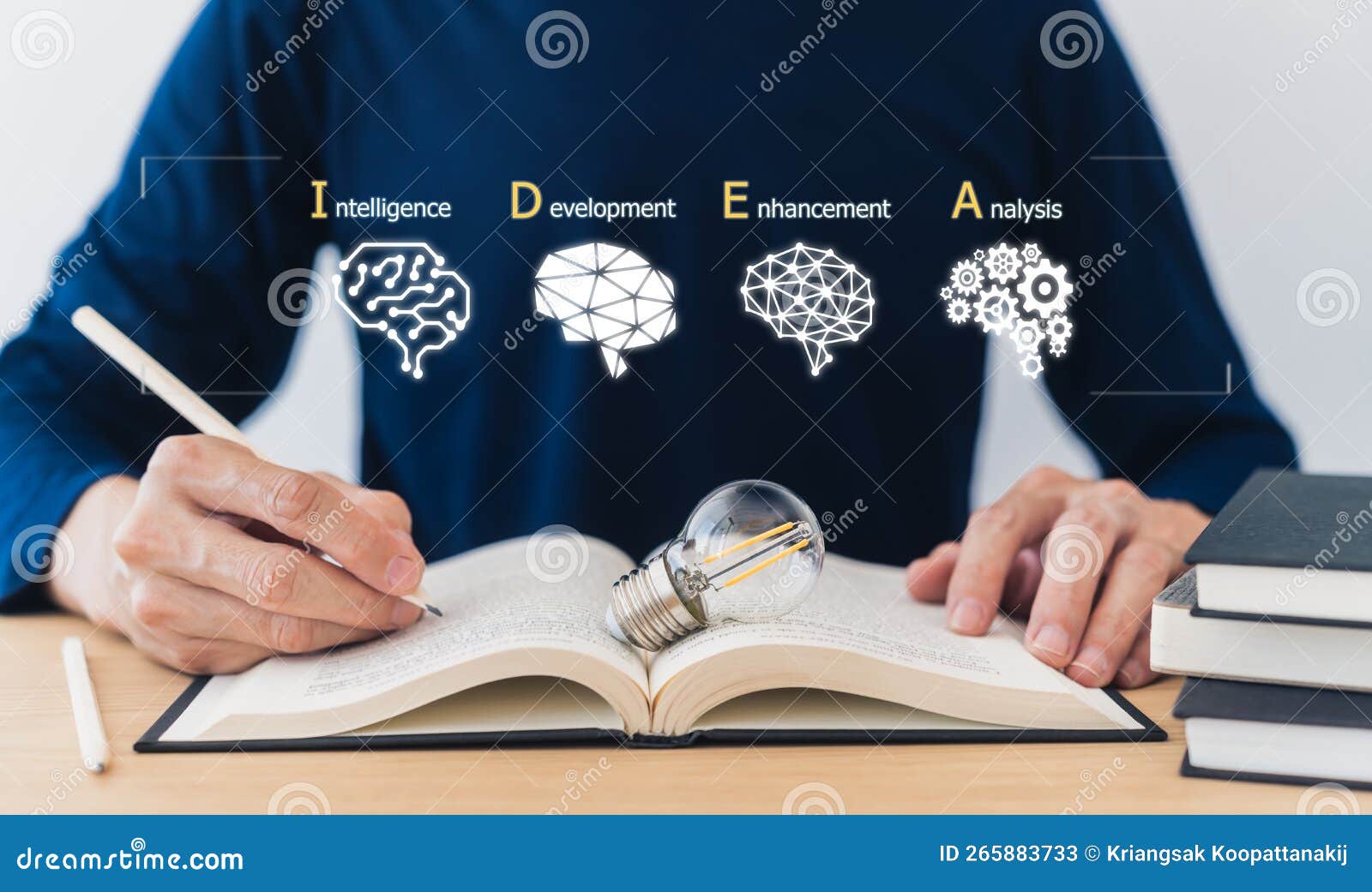 University Student Studying, Writing and Reading Book or Textbook with ...